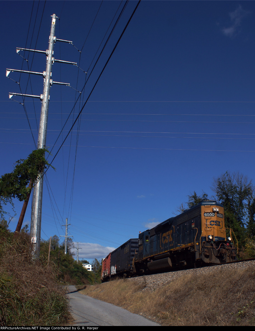 CSX 6550 (really a GP40-3 now, I believe) long-hood forward eastbound on the H74413 returns to ...